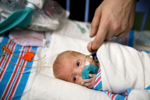 Heart-shaped cloths carrying the scent of moms and dads help soothe ...