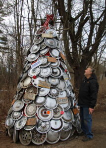 Bob Fisher's Christmas tree of hubcaps a tribute to his late wife ...