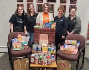 Community Bank collects food items for donation - Olean Times Herald