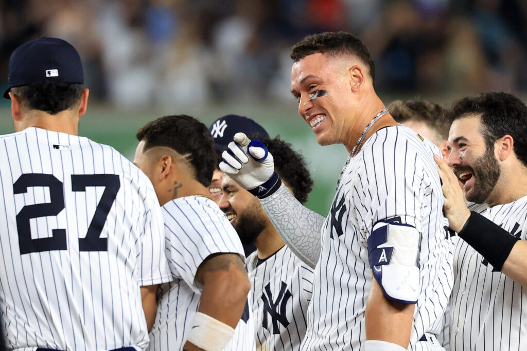 Yankees rally past Mariners 6-5 in extras to complete series sweep ...