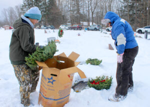 Volunteers place wreaths at veterans' graves in Olean's Mt. View ...