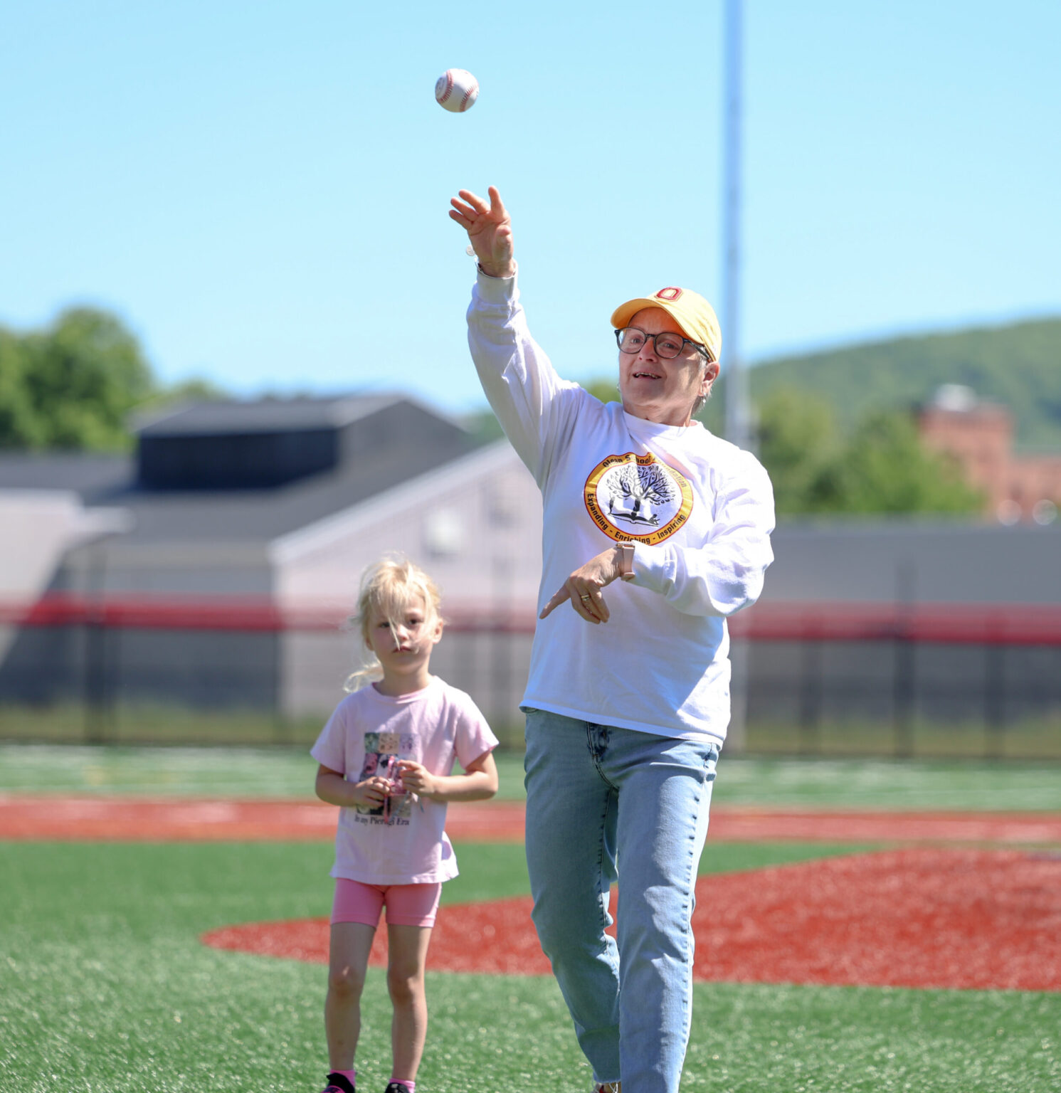 Scholla throws first pitch as students celebrate end of year at Oilers ...